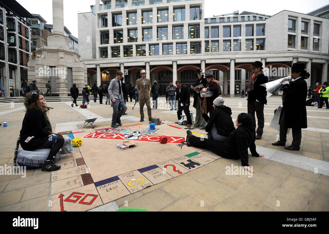 Anti-capitalist protesters play a giant game of Monopoly in Paternoster ...