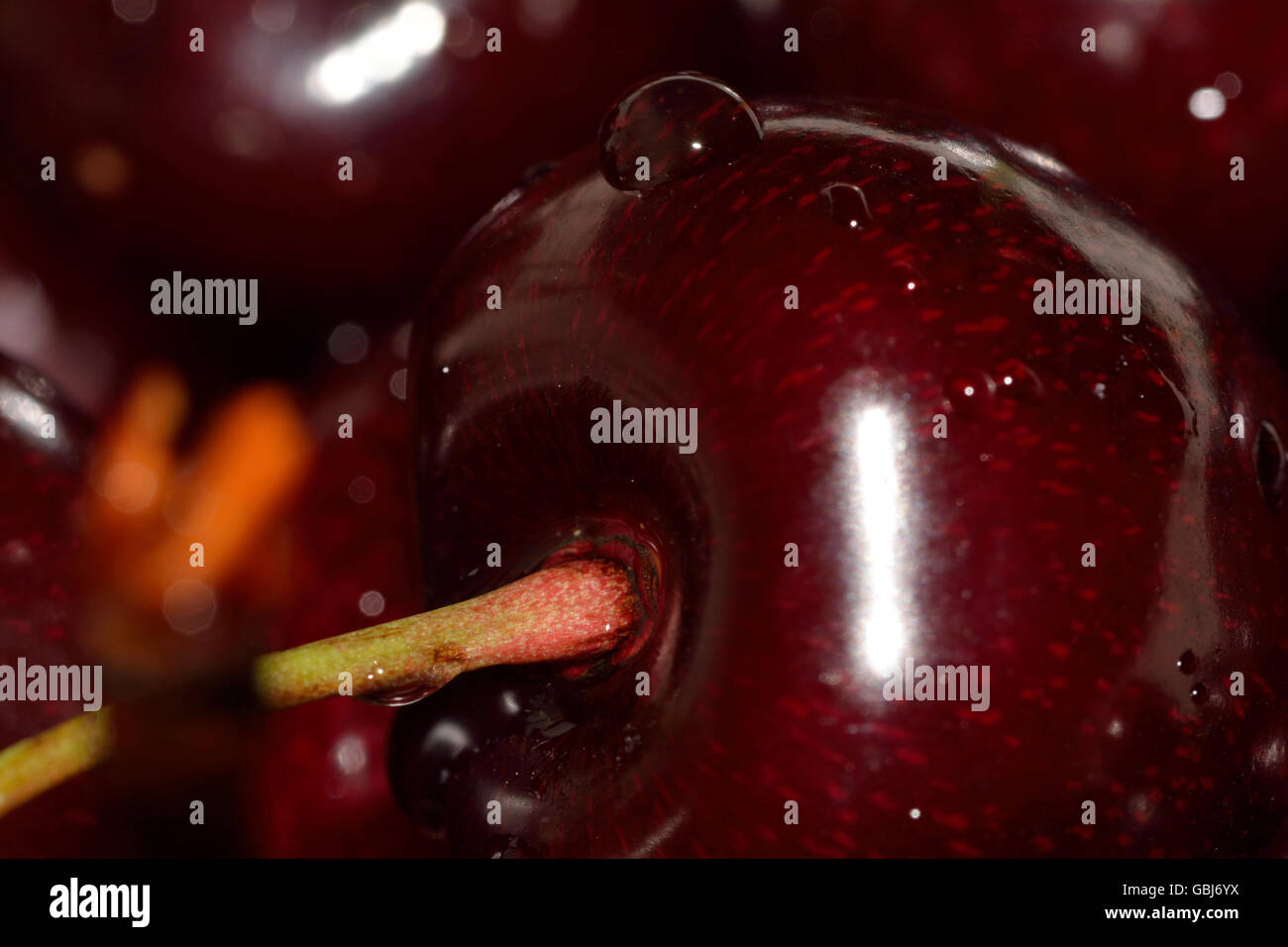 Water drop cherry hi-res stock photography and images - Alamy