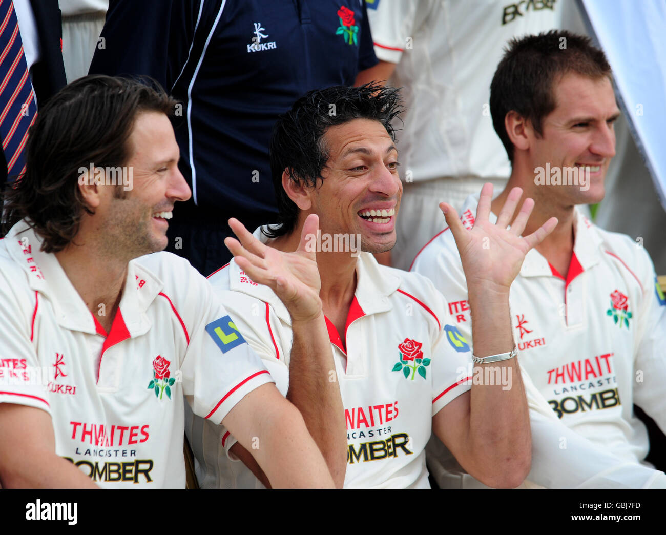 Lancashire's Sajid Mahmood (centre) poses for a photograph during the ...