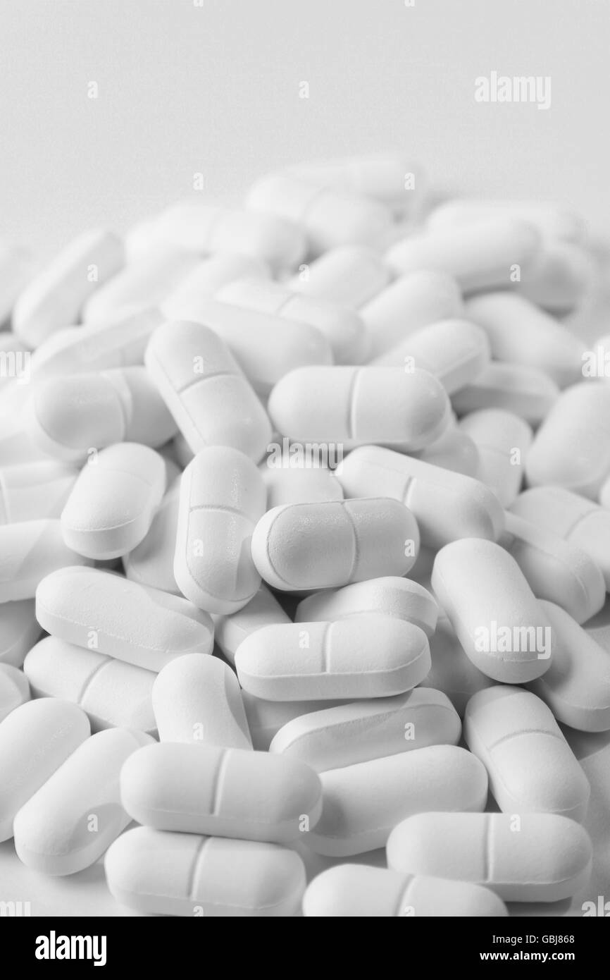 Pile of tablets closeup Stock Photo - Alamy