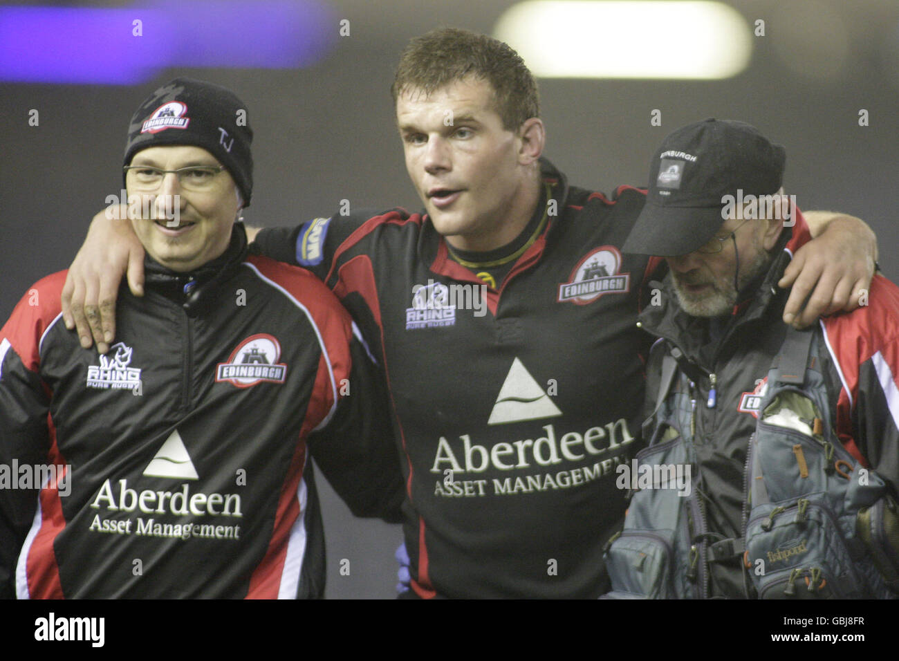 Edinburghs geoff cross centre is helped from the field hi-res stock ...