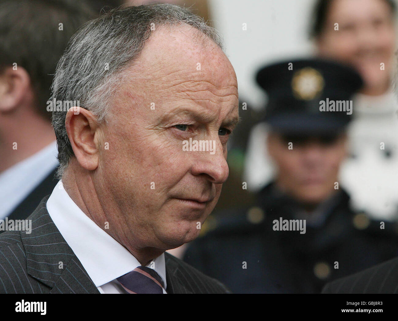 Justice minister Dermot Ahern attends the guard of honour at Corrigan ...