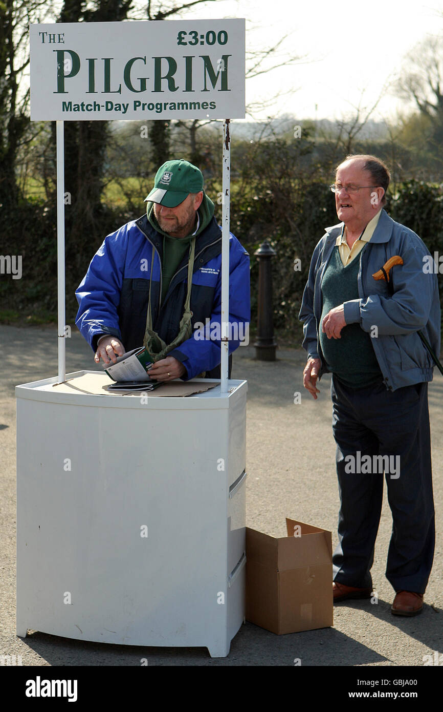 A stand selling The Pilgrim match day programmes, outside the ground ...