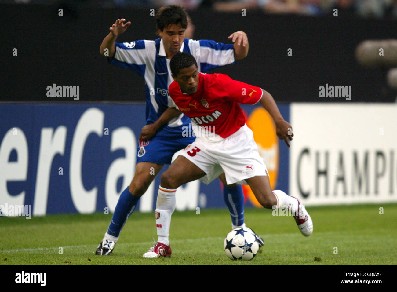 Monacos patrice evra front shields the ball from fc deco hi-res stock ...