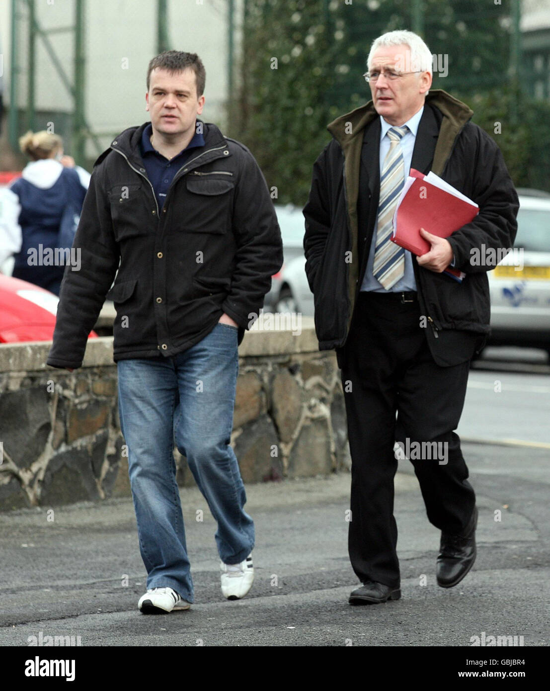 Pat Vernon (right), solicitor for Colin Duffy arrives with his brother ...
