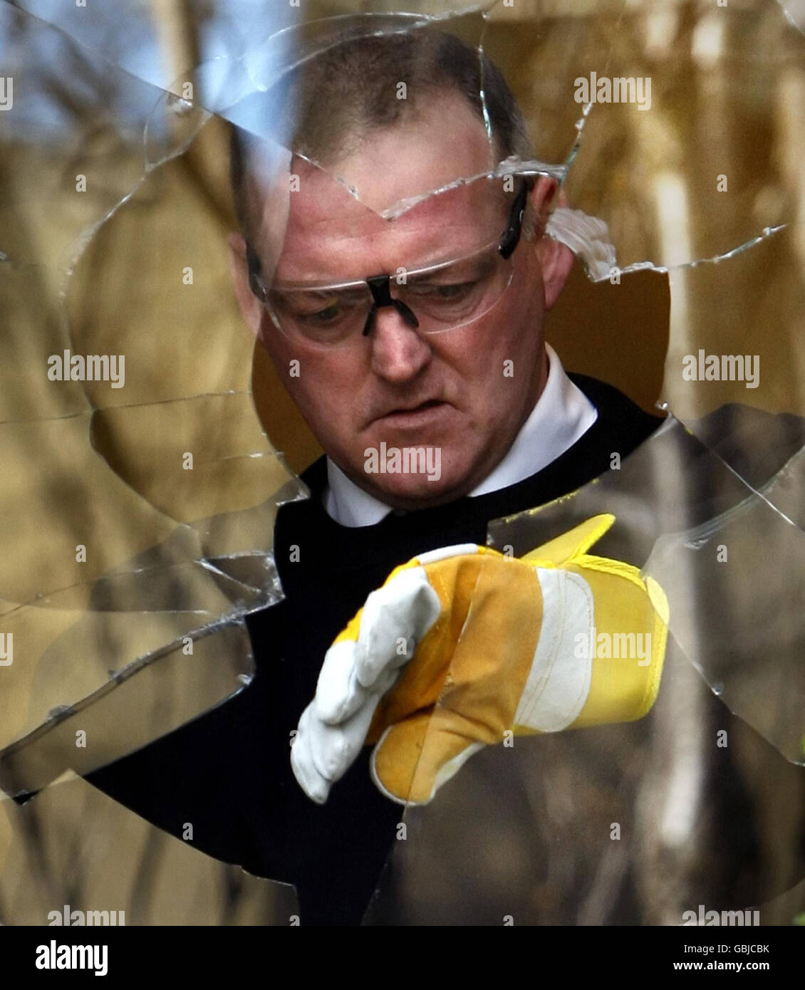 The scene at the home of former bank boss Sir Fred Goodwin in Edinburgh ...