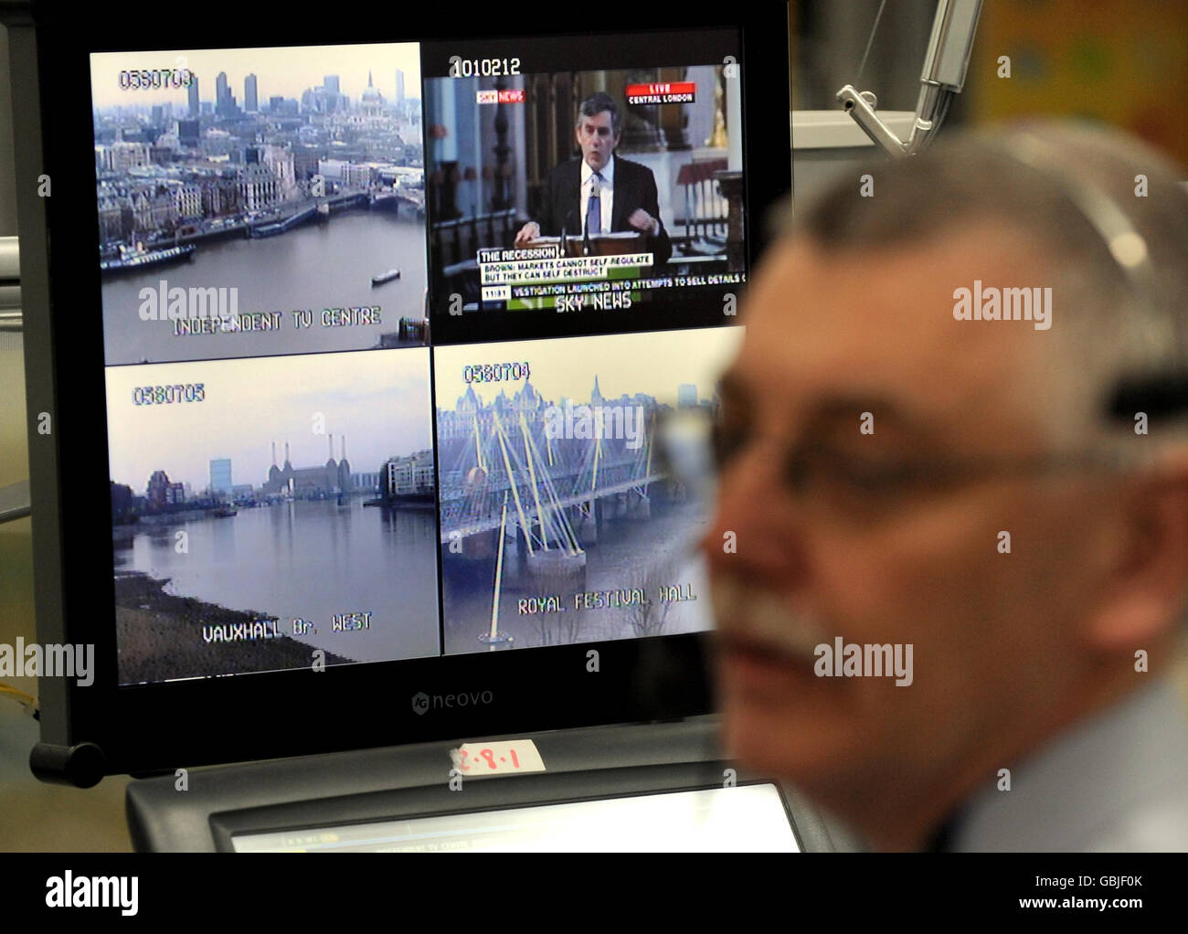 A Police officer operates a control desk in the Metropolitan Police ...