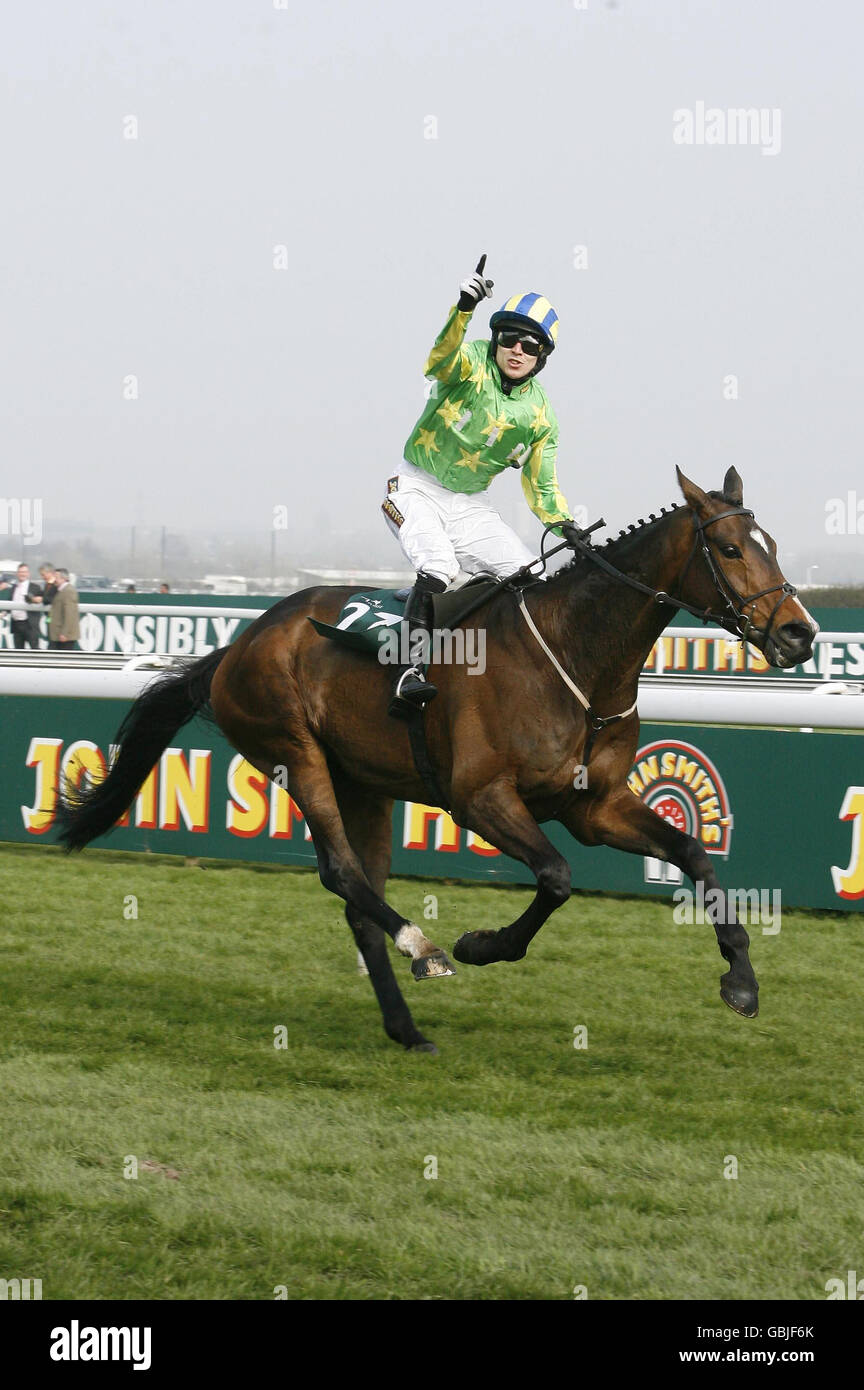 Irish Raptor and jockey Paddy Brennan celebrate winning the John Smith ...