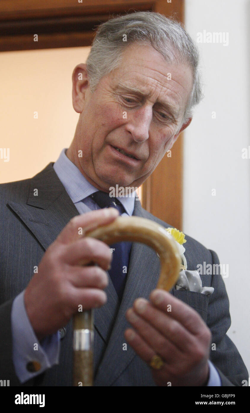 Prince Charles is presented with a Shepherd's Crook during a visit to ...