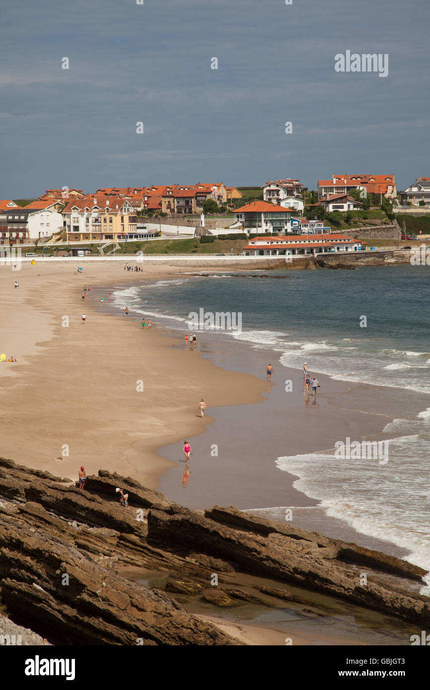 View of the beach and harbour at the seaside resort of comillas ...