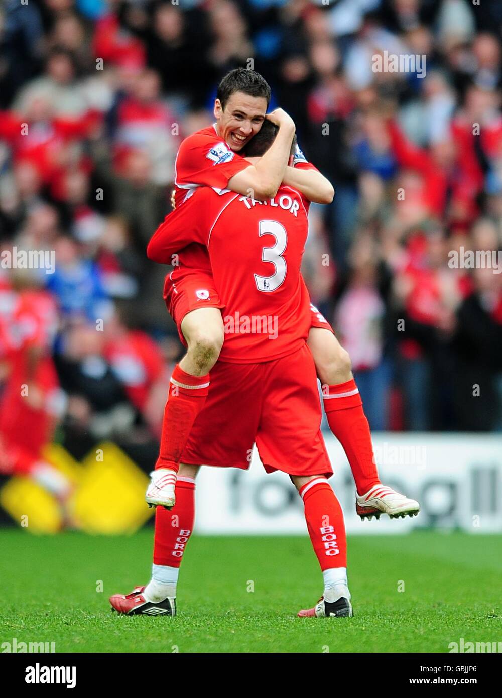 Middlesbrough's Stewart Downing (left) and Andrew Taylor celebrate ...