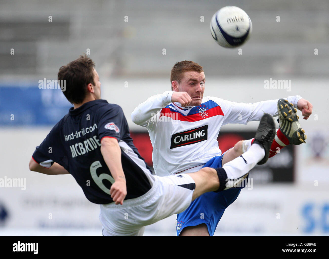 Rangers' John Fleck tussles with Falkirk's Kevin McBride during the ...