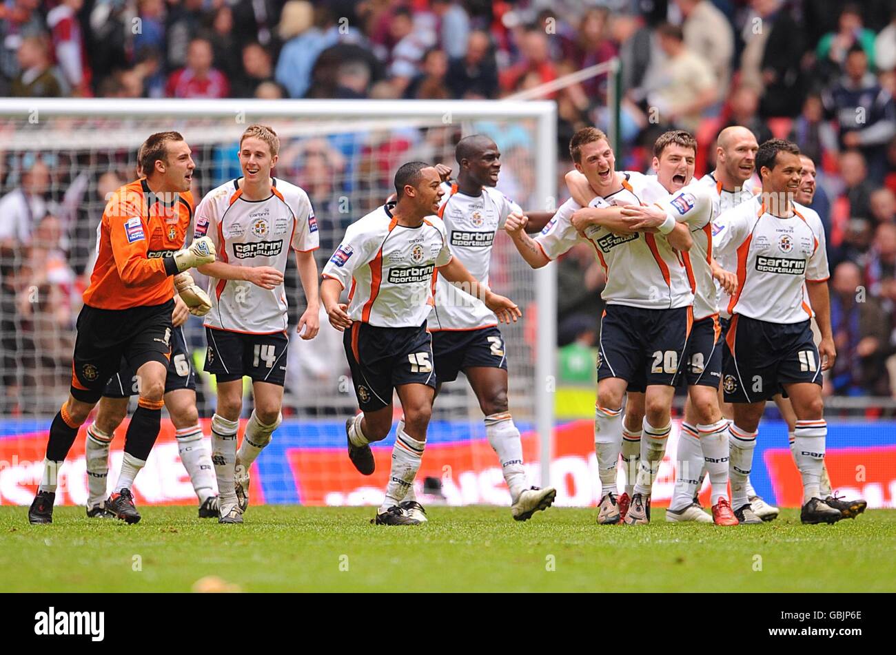 Luton town players celebrate their victory at the final whistle hi-res ...