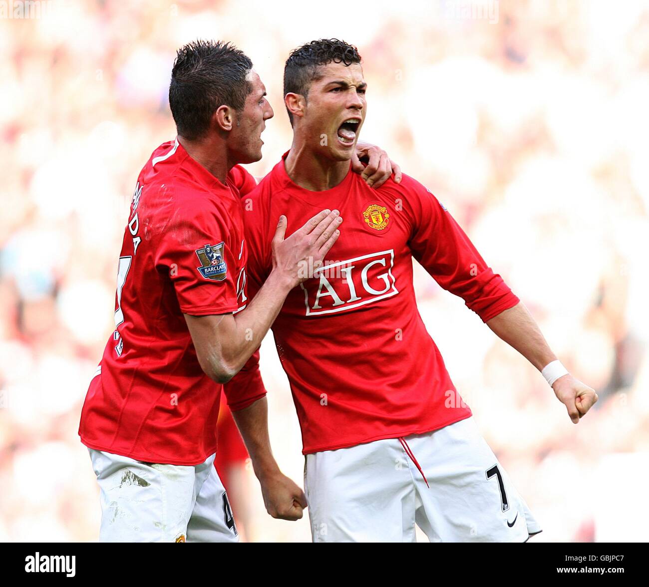 Manchester United's Cristiano Ronaldo (right) celebrates scoring his ...
