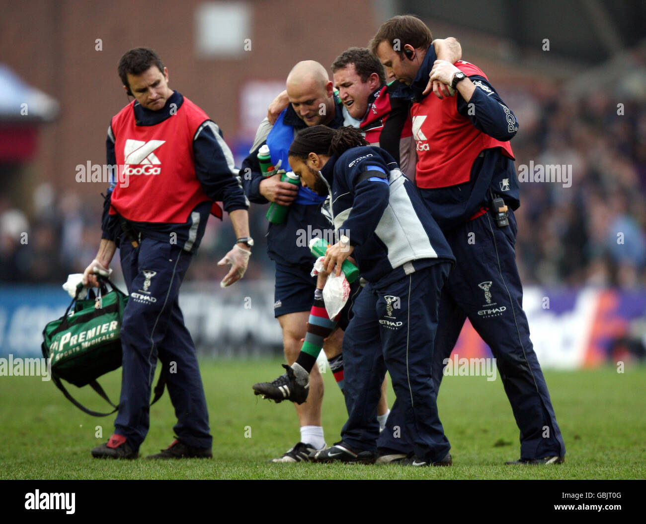 Twickenham Stoop Stadium. Harlequins Chris Malone is carried off with a ...