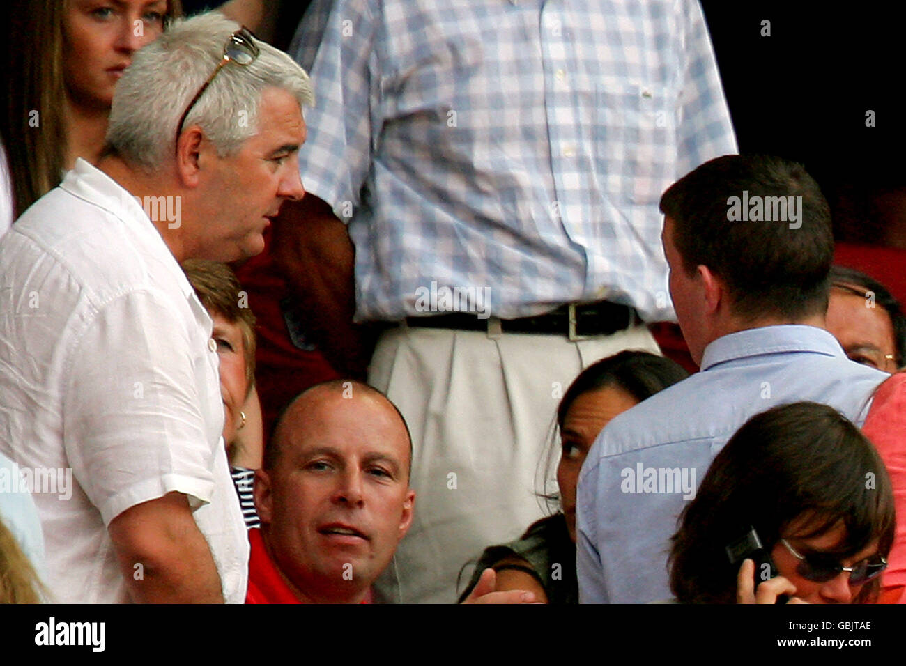 Wayne Rooney's agent Paul Stretford (left) has words with Graham Rooney ...