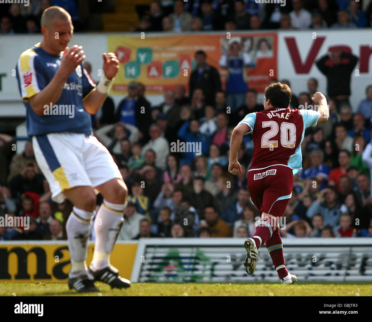 Burnley's Robbie Blake turns to celebrate his goal as Cardiff's Darren ...