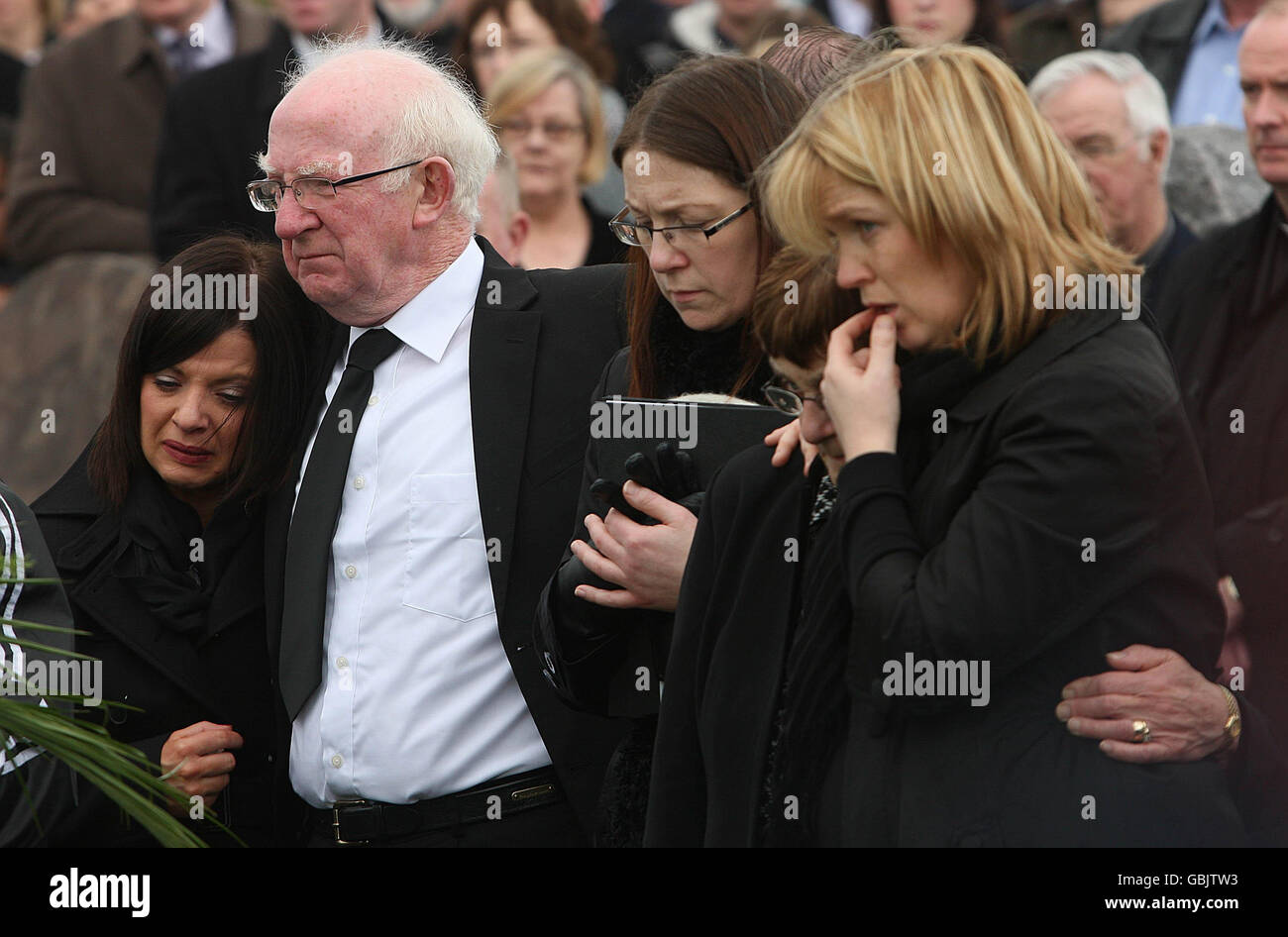 The family of Robert McCallion at his funeral today. The garda was ...