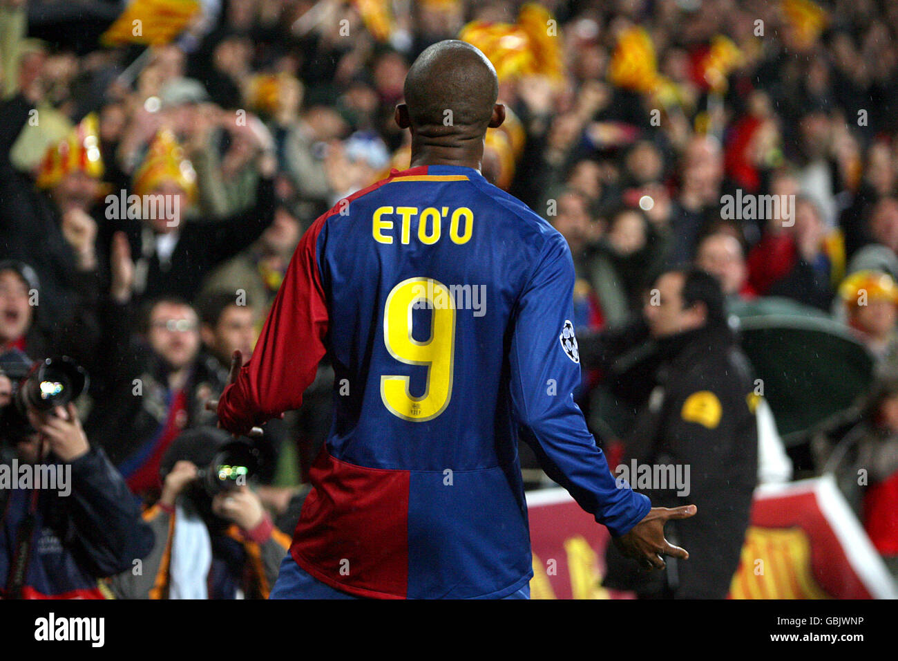 Barcelona's Samuel Eto'o celebrates in front of the fans after scoring ...