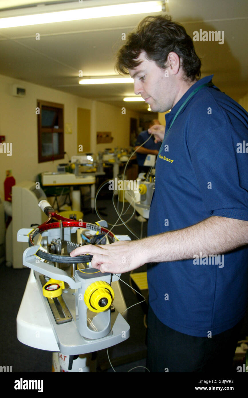 Tennis - Wimbledon 2004 - Second Round. Racquets are re-strung at ...