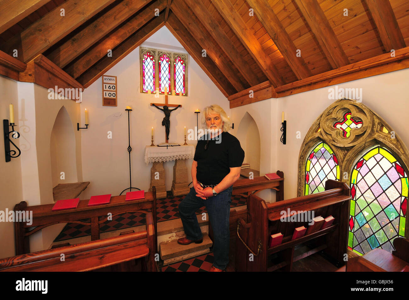 Couple build chapel in garden Stock Photo - Alamy