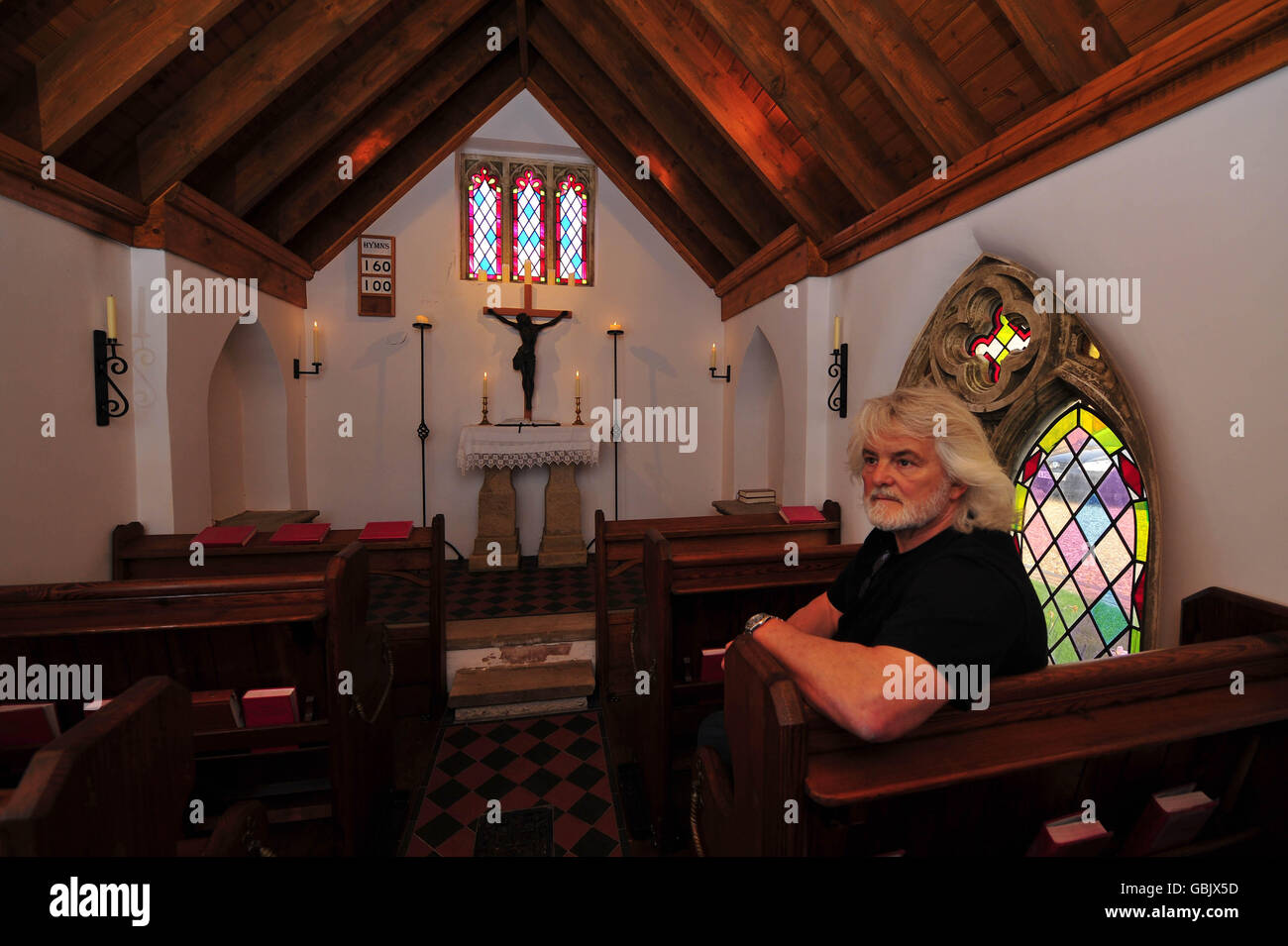 Couple build chapel in garden Stock Photo - Alamy