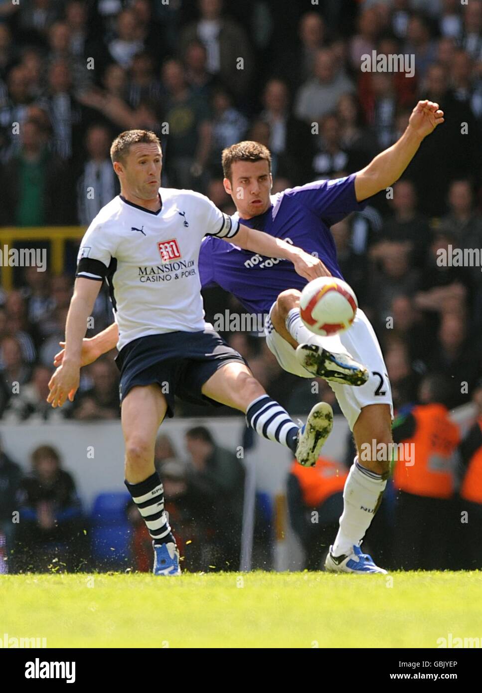 Newcastle United's Steven Taylor (right) and Tottenham Hotspurs' Robbie ...