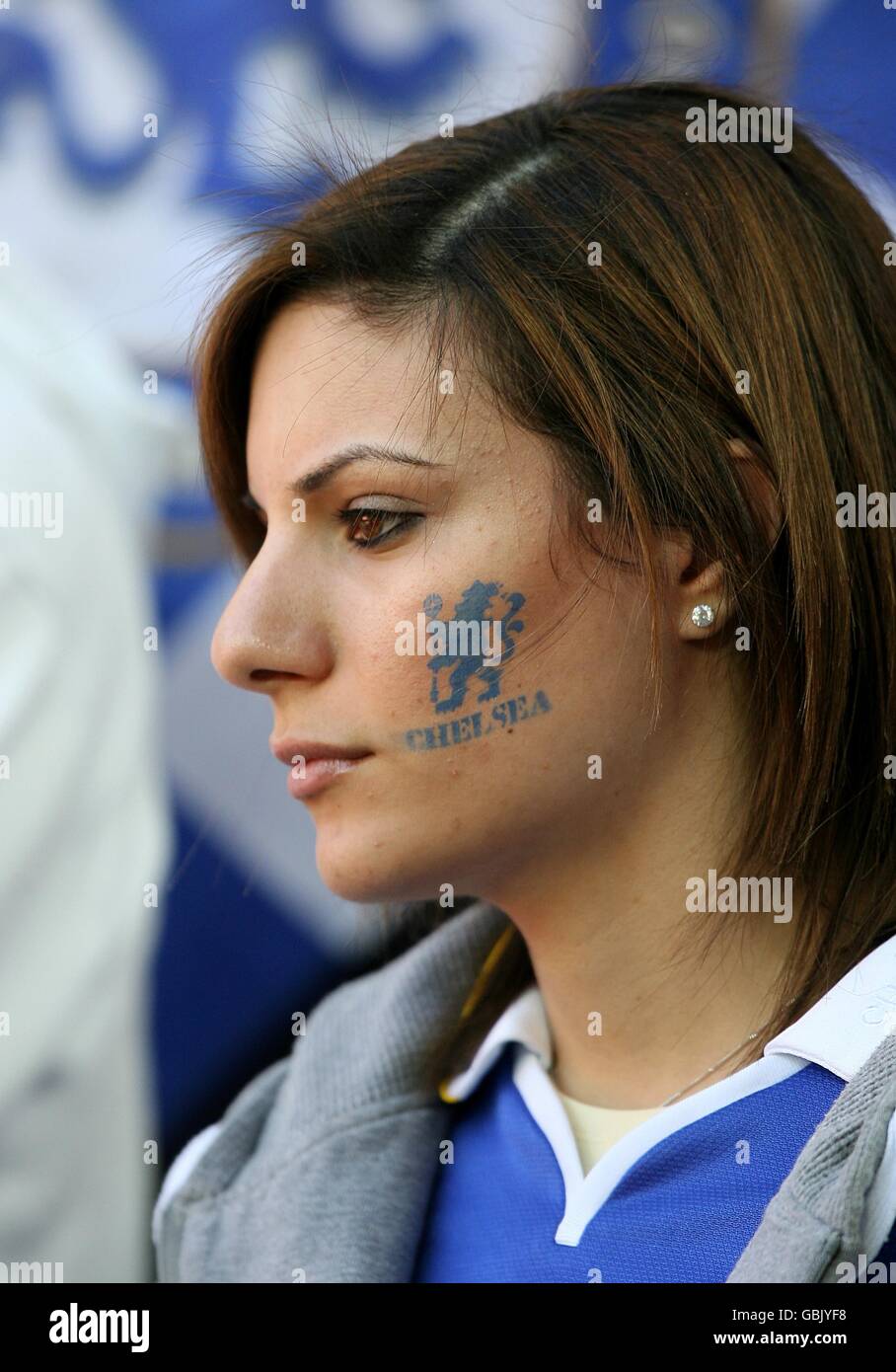 Chelsea fan with face paint in the stands hi-res stock photography and ...