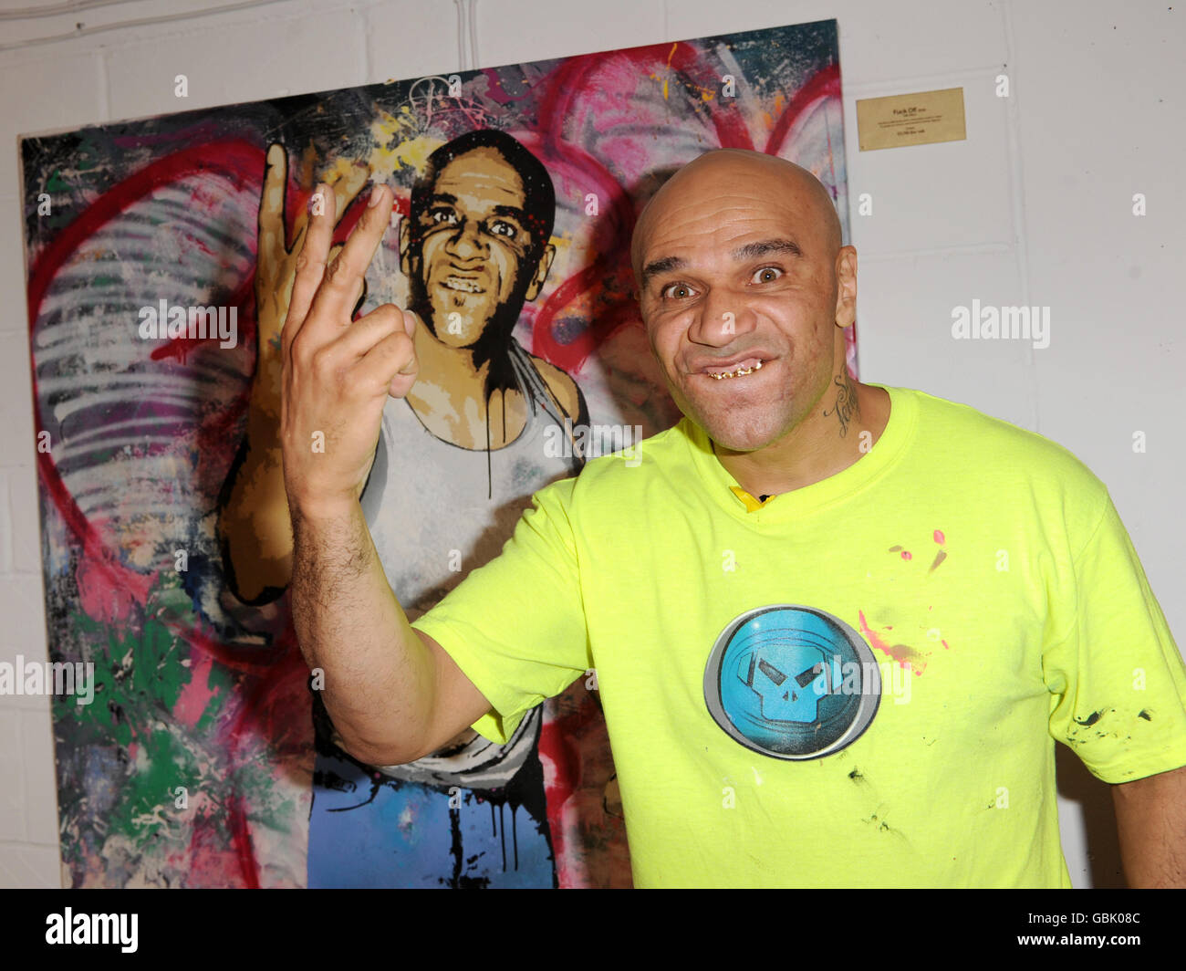 Goldie poses in front of one of his paintings at the Maverick Showroom ...
