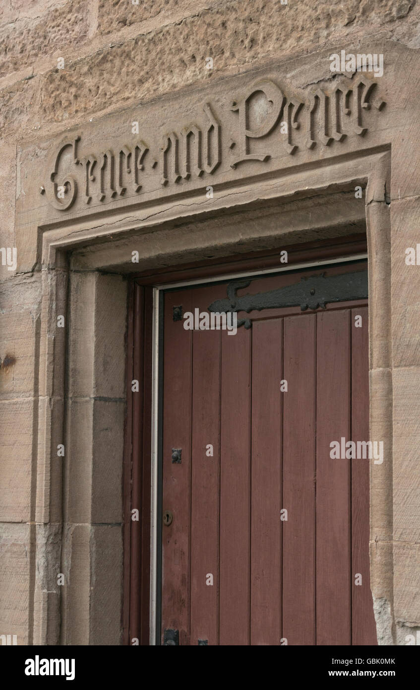 Motto of Glovers guild, "Grace and Peace",carved over door,The Fair ...
