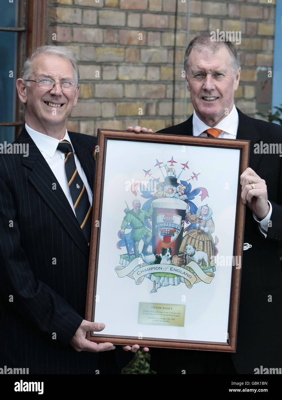 Frank Basey from Selby in North Yorkshire, left, receives the ...