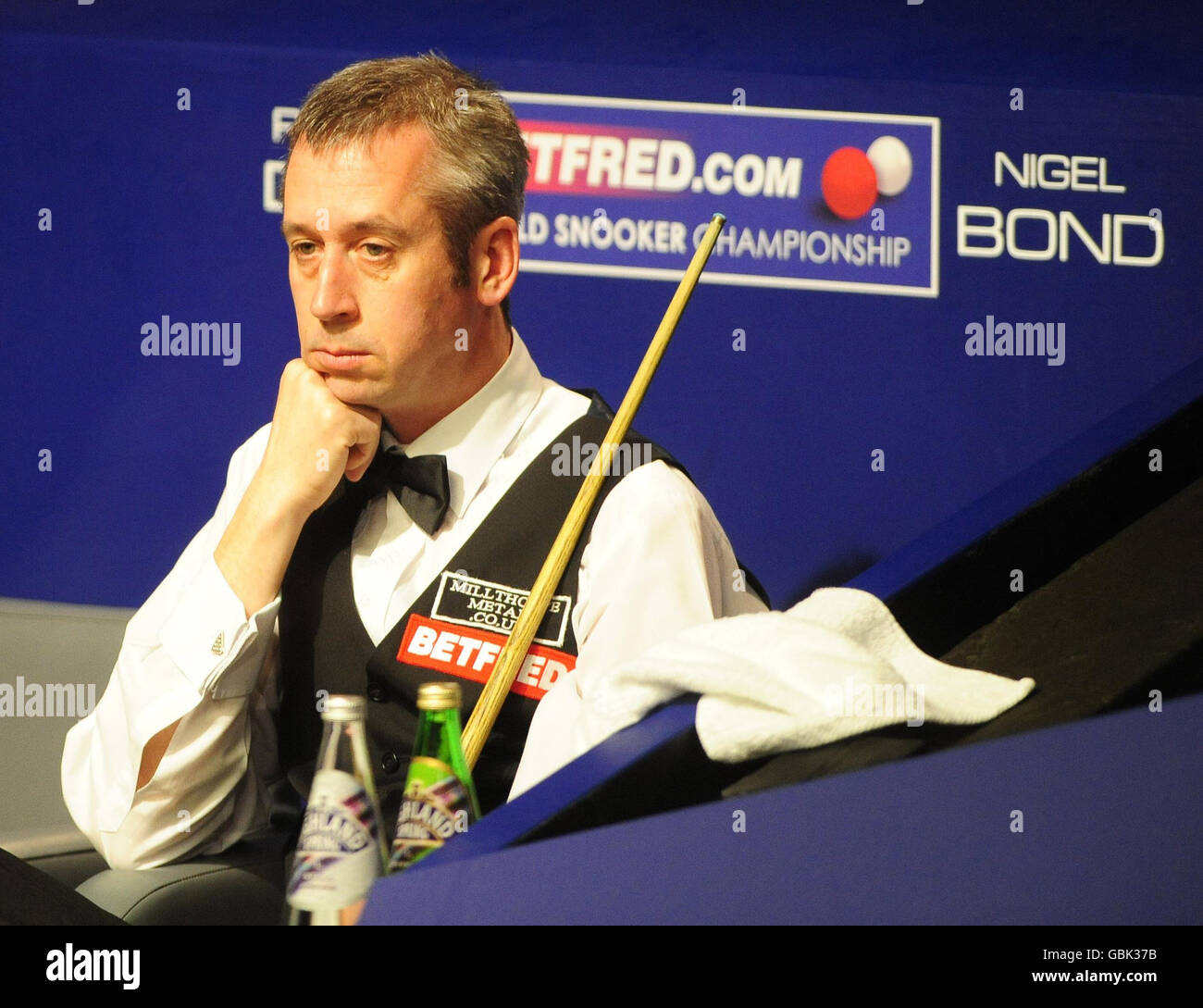 Nigel Bond looks on in his match against Ryan Day during the Betfred ...