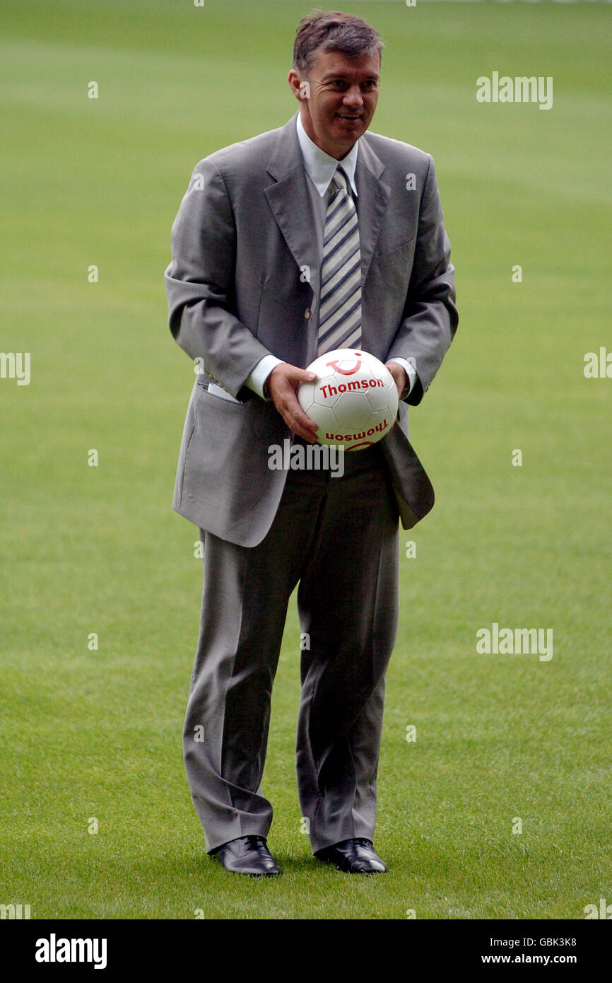 Tottenham hotspurs new head coach jacques santini poses with ball hi ...