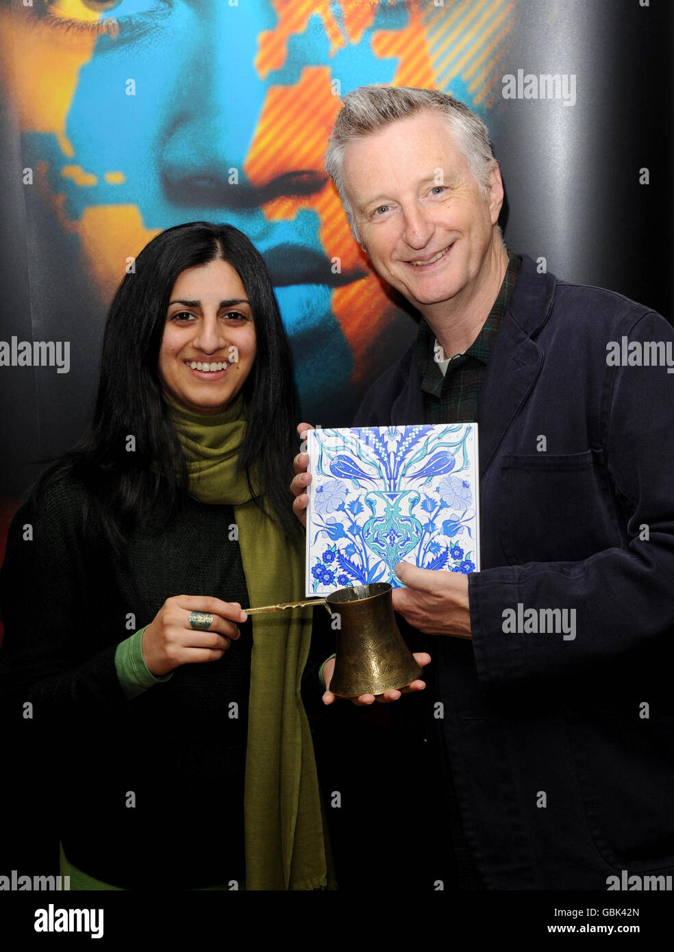 Billy Bragg (right) holding a ceramic tile and Nasreen Akhtar from ...