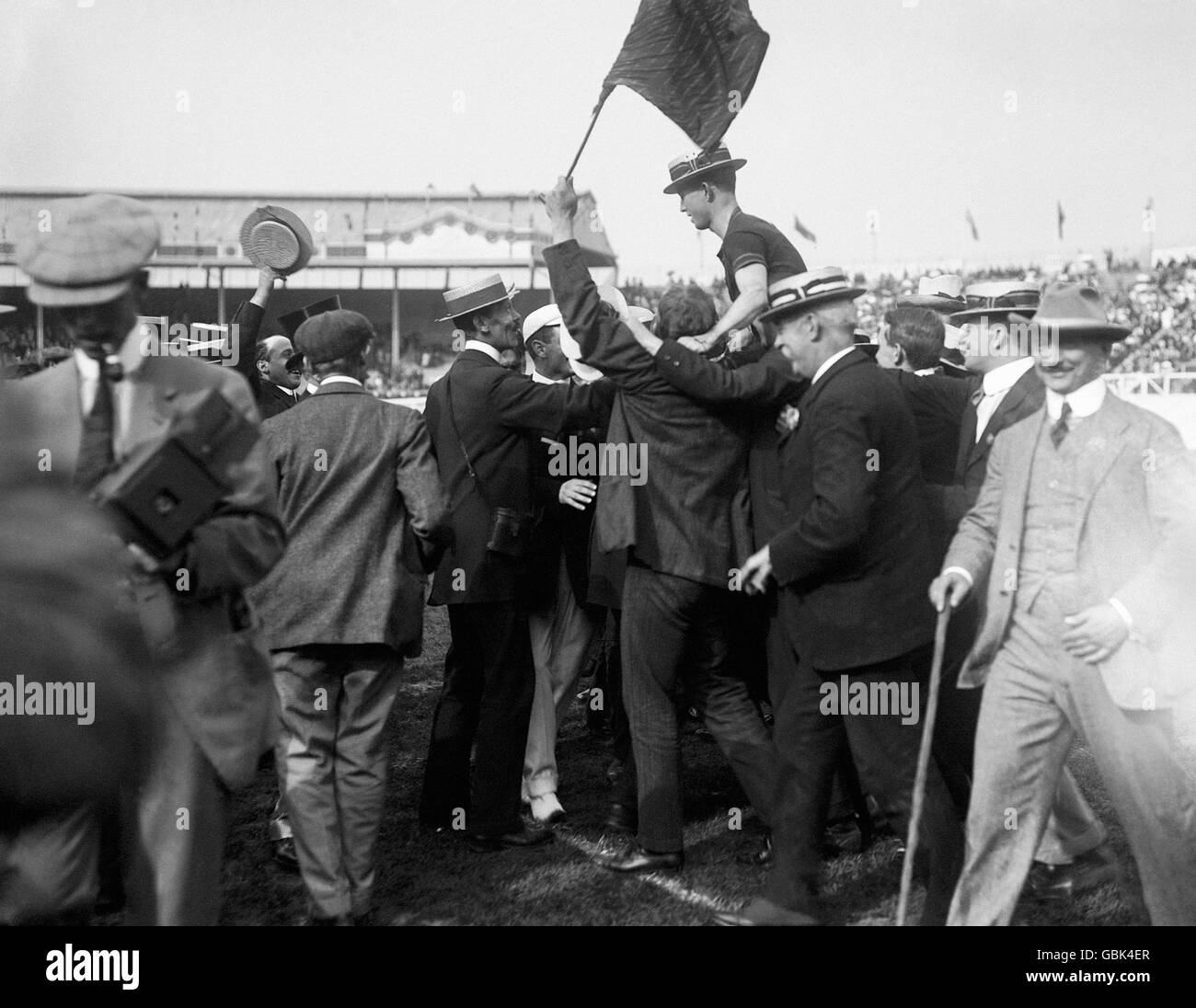 South Africa's Reggie Walker is carried shoulder high by his jubilant ...