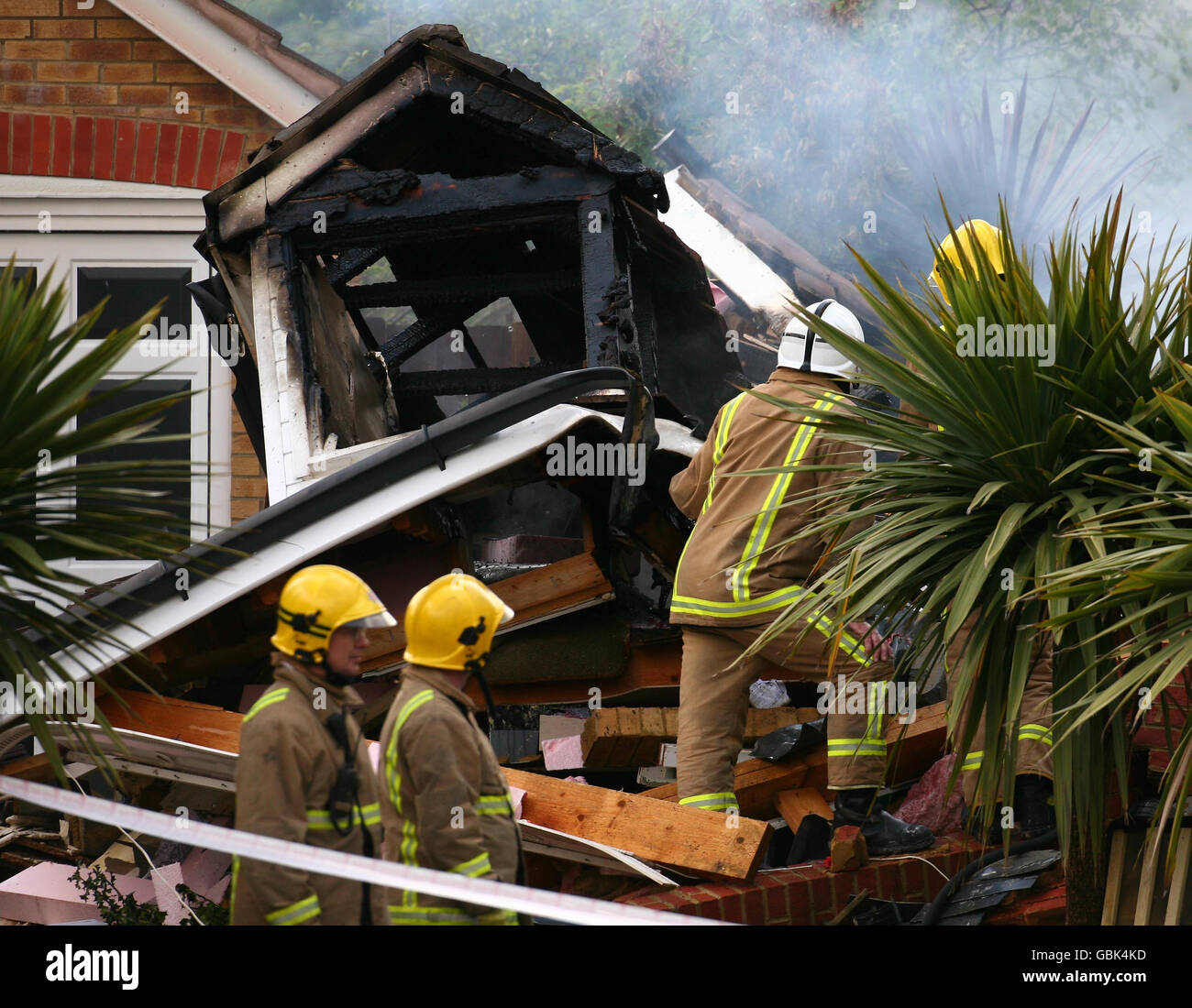 Firemen at the scene in Sittingbourne, Kent, after an explosion earlier ...