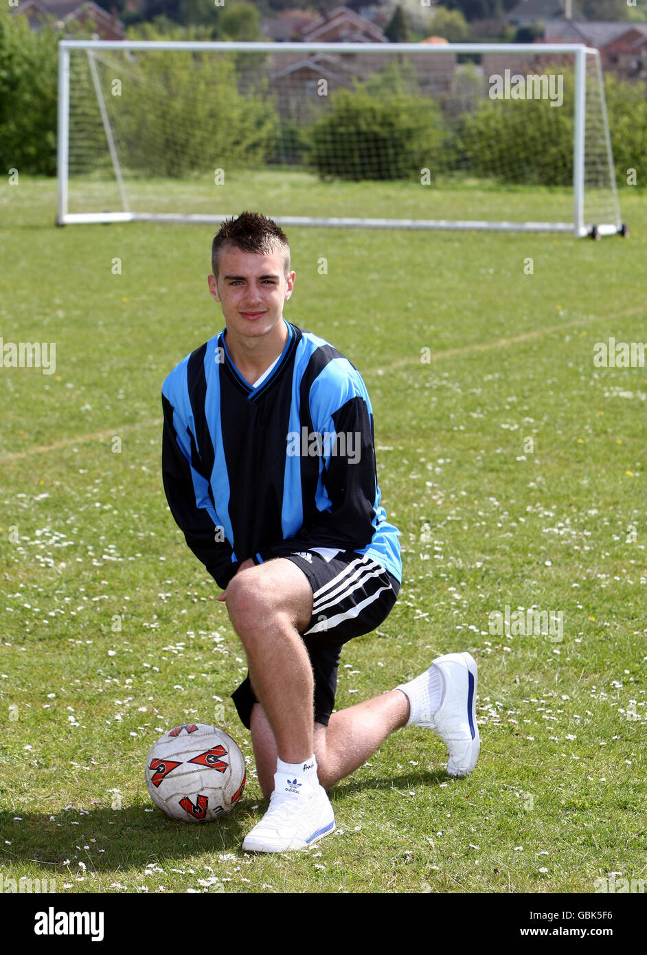 16 year old Richard Peniket poses on the playing fields of Haybridge ...