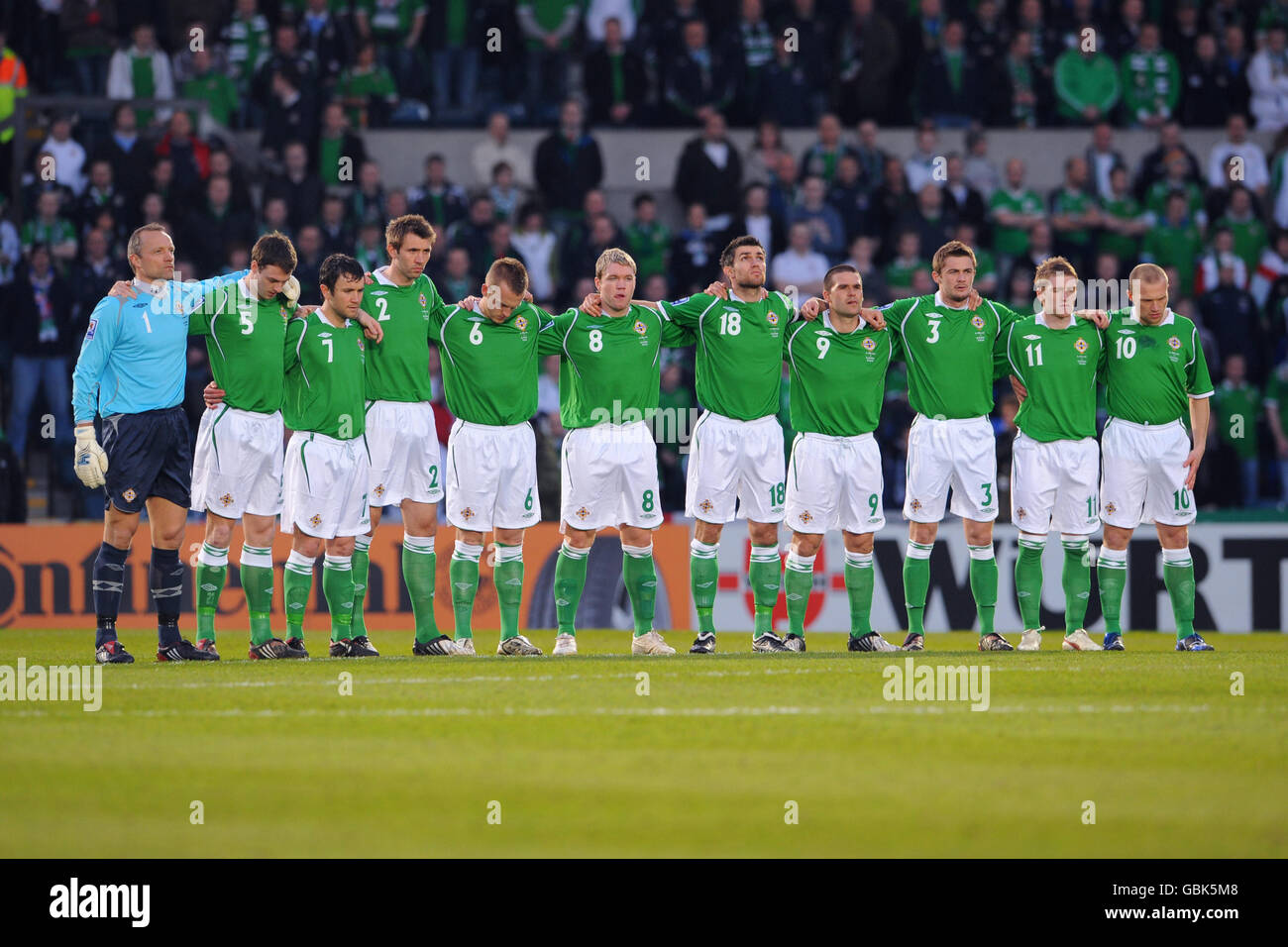 Northern Ireland players line up in the centre circle before kick off ...