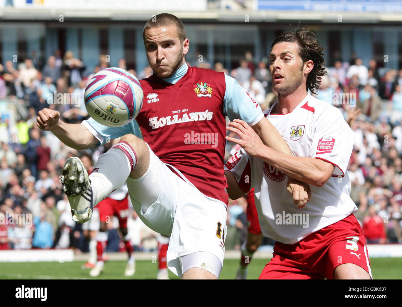 Burnley's Martin Paterson (left) battles with Bristol City's Jamie ...