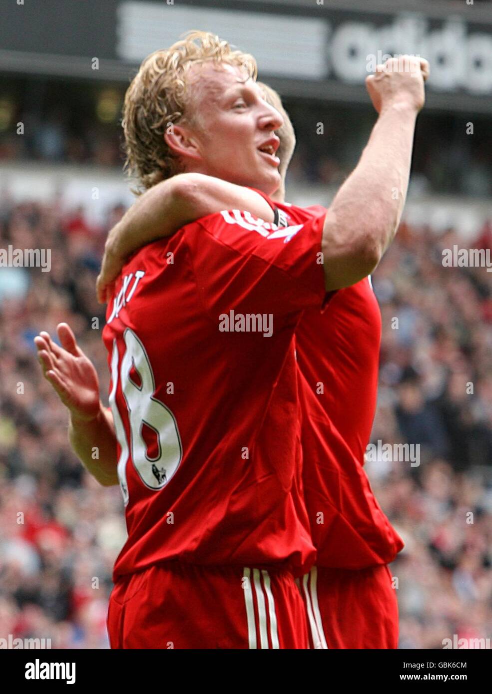Liverpool's Dirk Kuyt celebrates scoring the opening goal Stock Photo ...