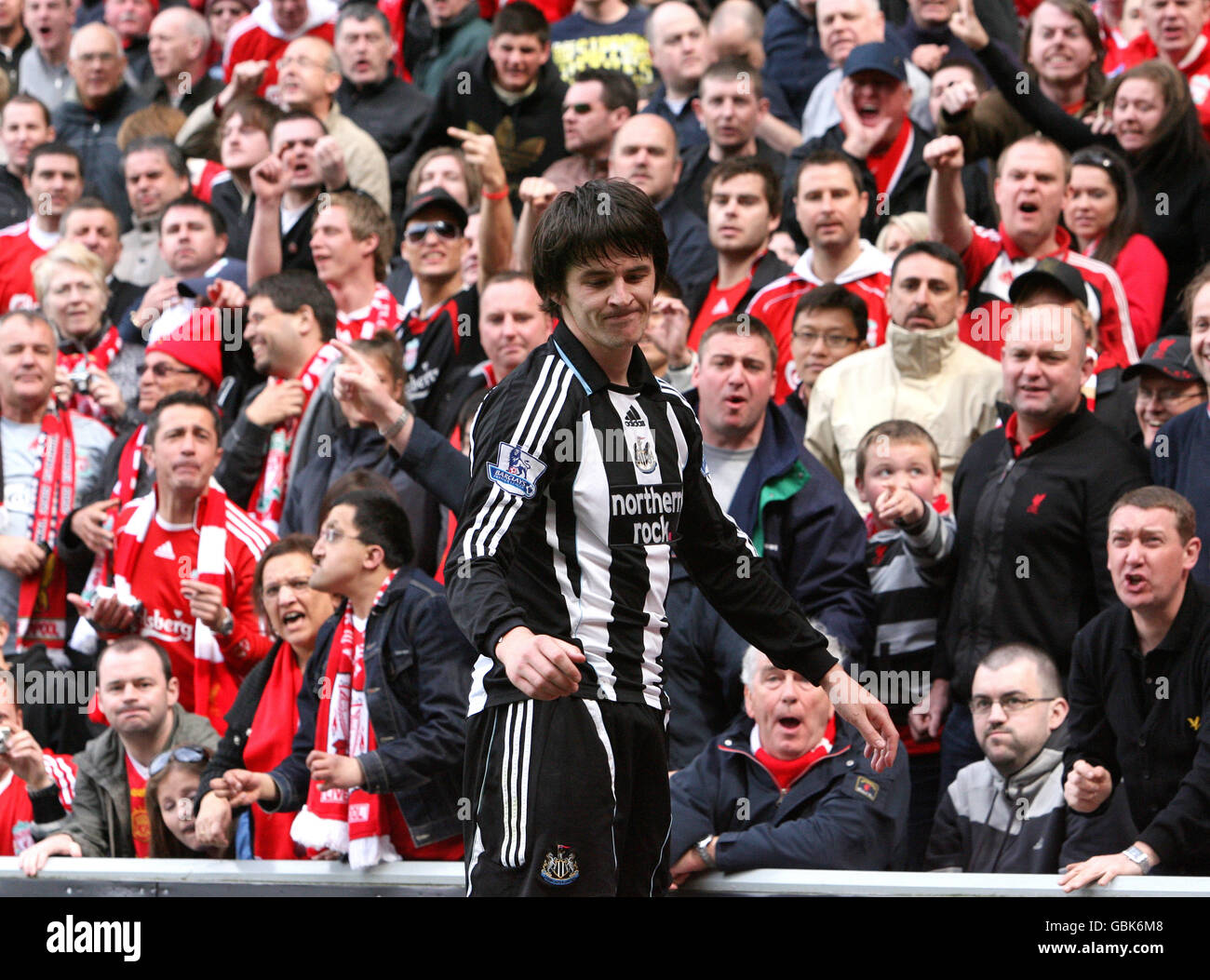Liverpool fans shout at Newcastle United's Joey Barton after he fouled ...