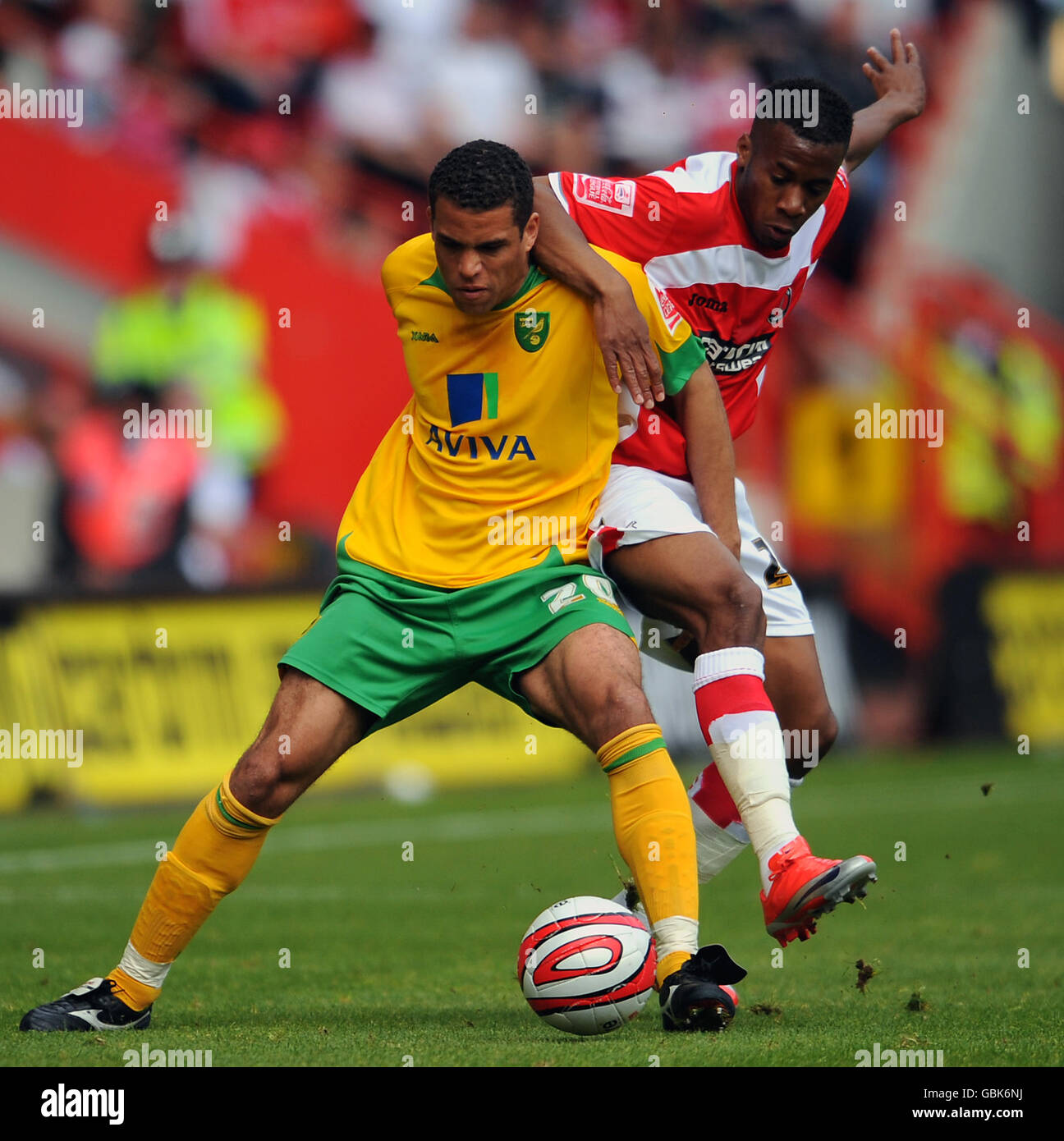 Charlton Athletic's Therry Racon and Norwich City's Darel Russell Stock ...