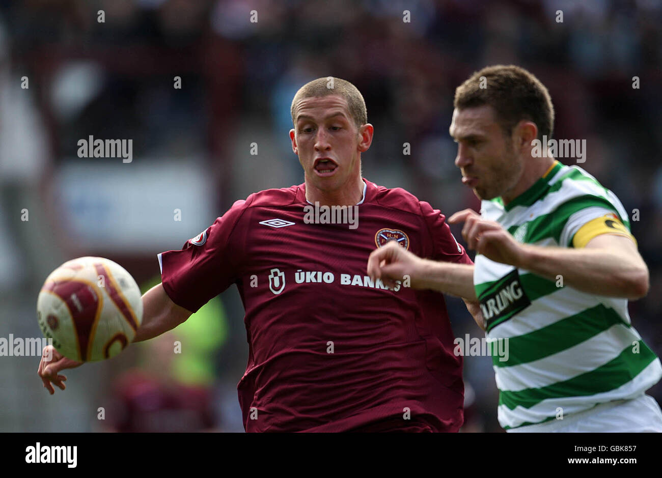 Hearts' Callum Elliot in action with Celtic's Stephen McManus during ...