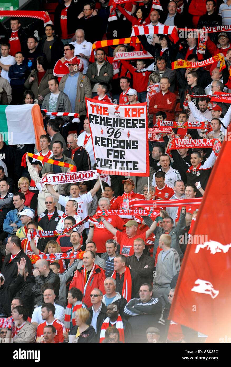A Liverpool fan holds up a banner in memory of the Hillsborough ...