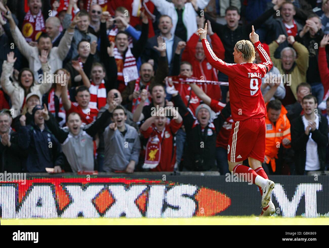 Liverpool's Fernando Torres celebrates in front of the home fans after ...