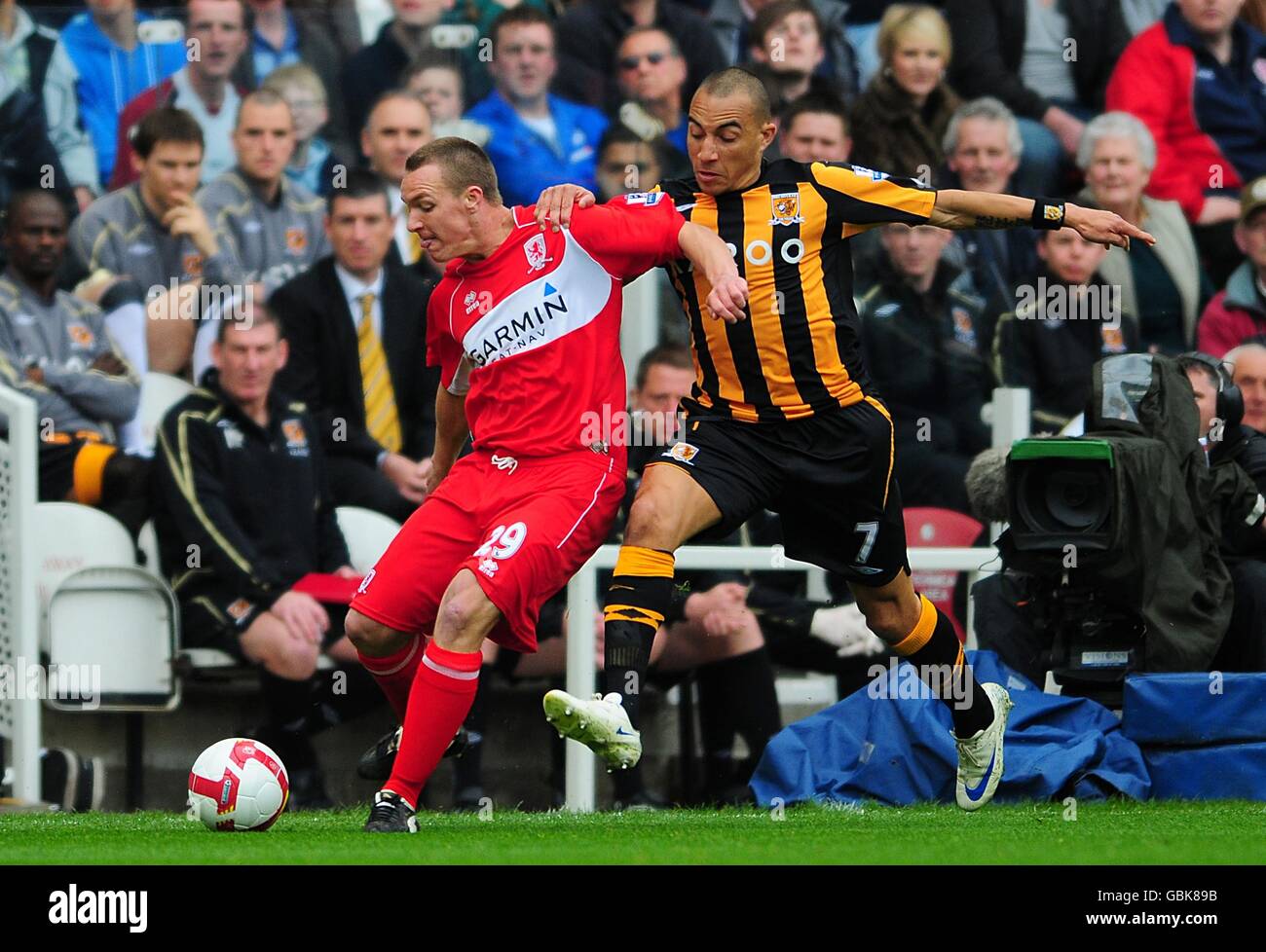 Middlesbrough's Tony McMahon (left) and Hull City's Craig Fagan battle ...