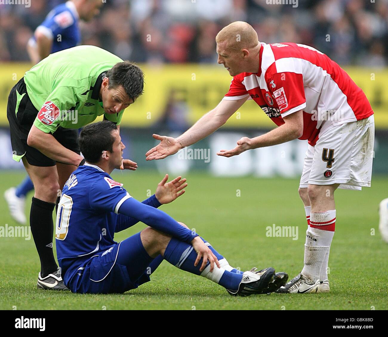 Charlton Athletic's Nick Bailey pleads with referee Lee Probert after ...