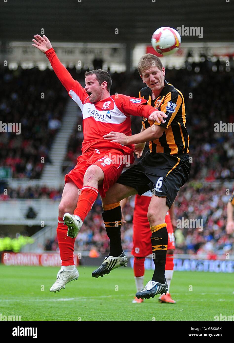 Hull City's Andy Dawson (right) and Middlesbrough's Matthew Bates ...
