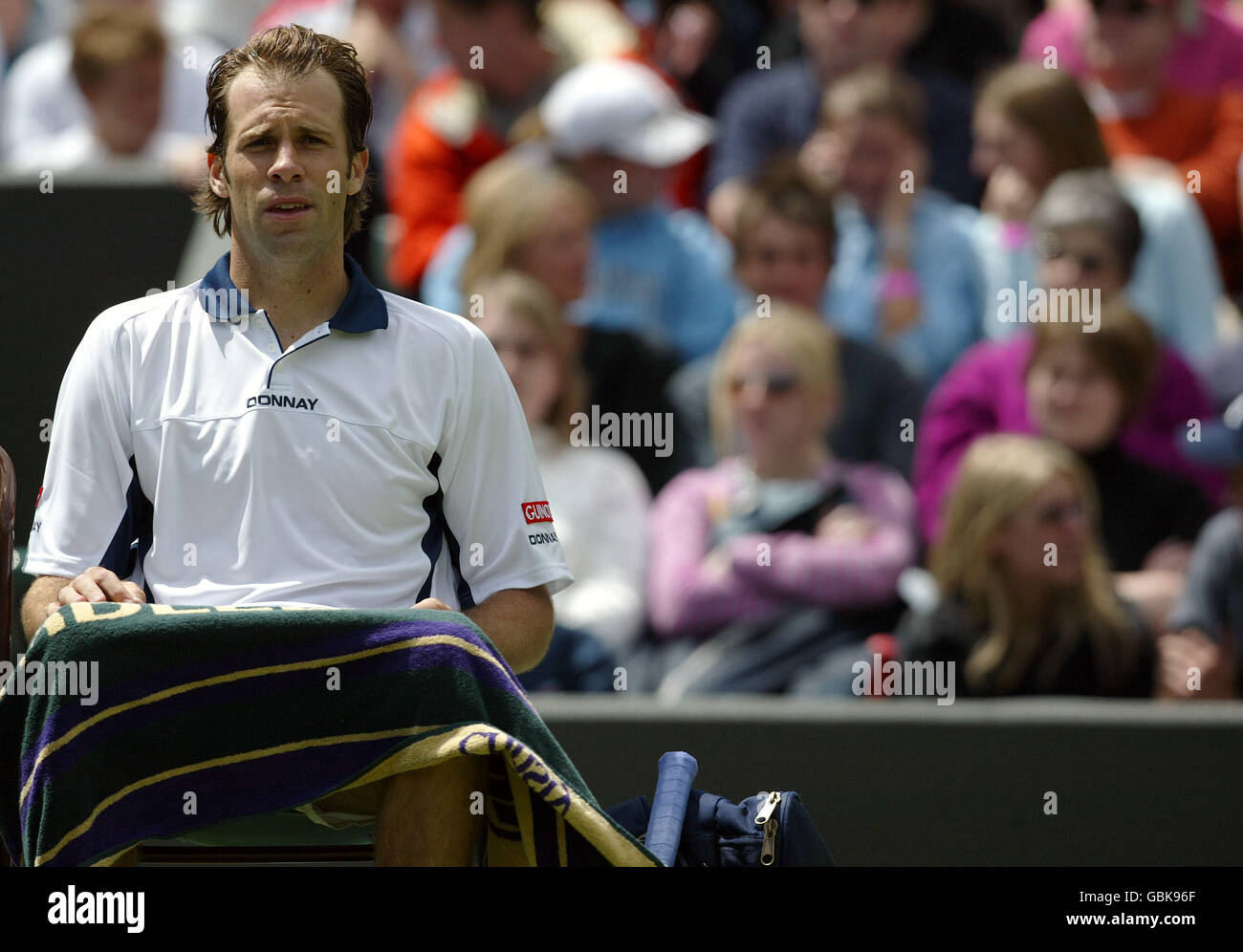 Greg rusedski takes breather during his win against davide sanguinetti ...