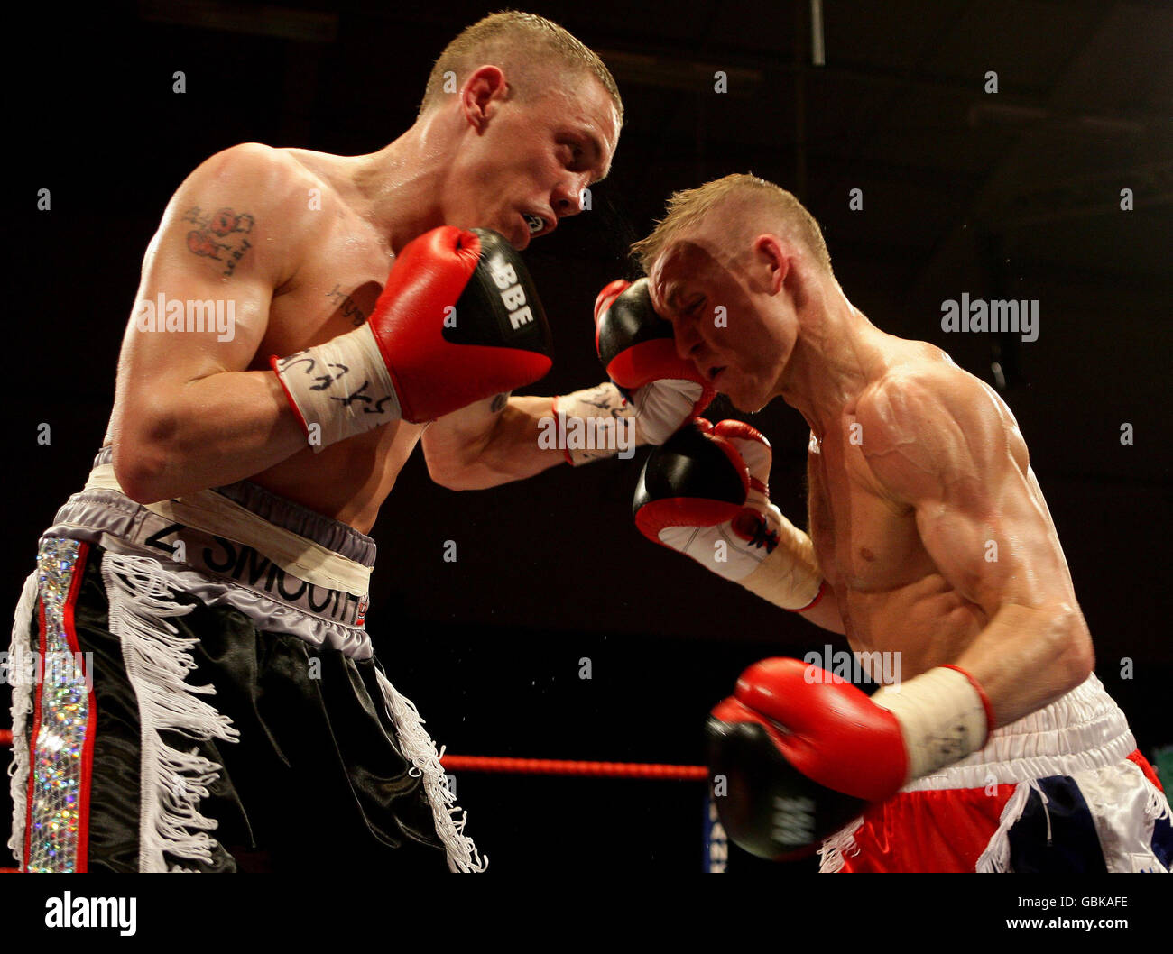 Jason Booth (left) on top against Mark Moran (right) during the Super ...